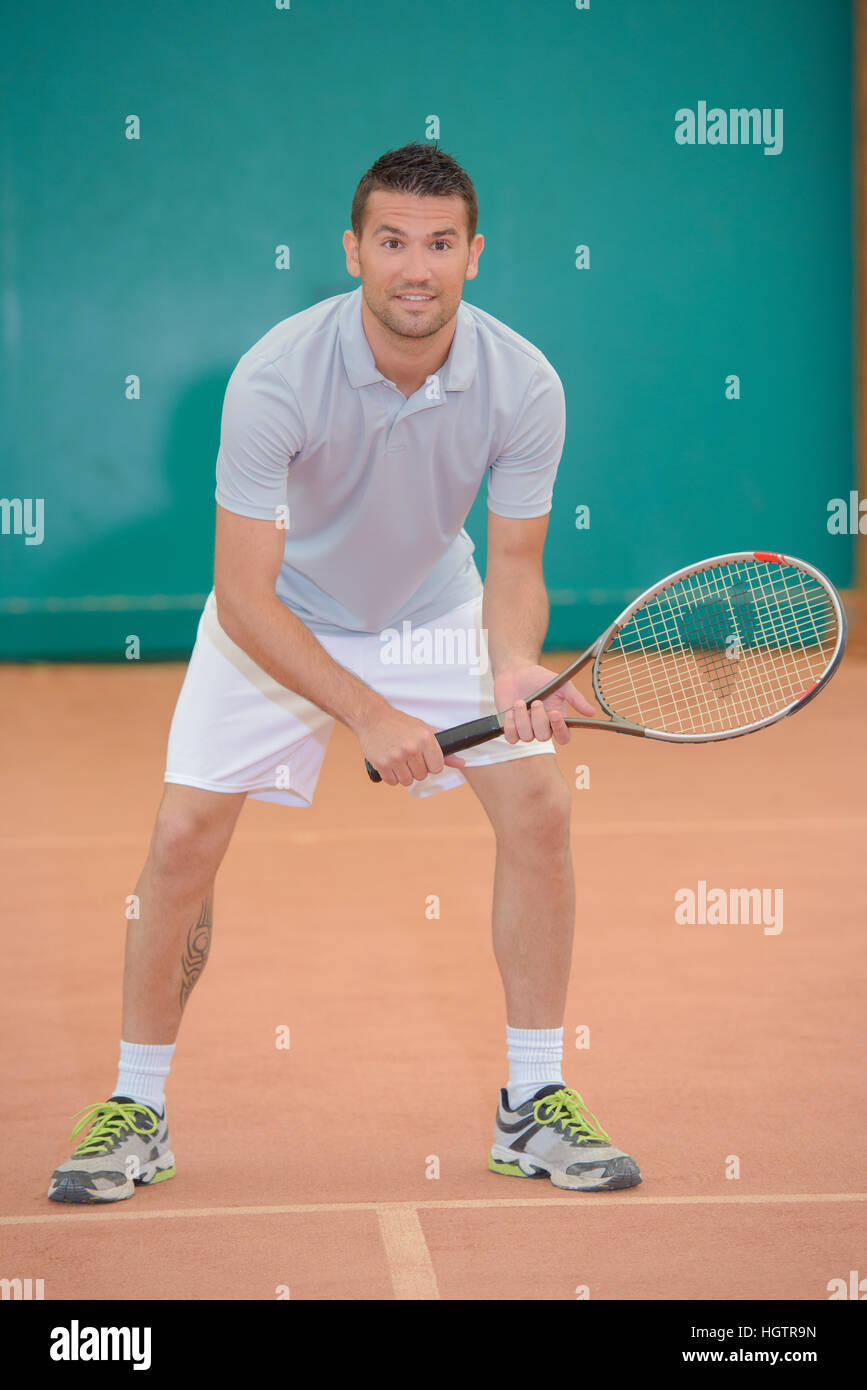 Portrait of man playing tennis Stock Photo - Alamy