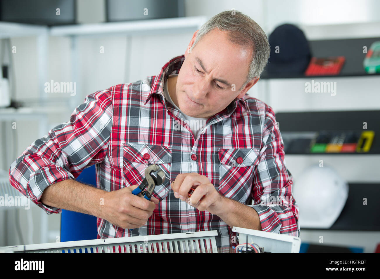 plumber man with tools Stock Photo - Alamy