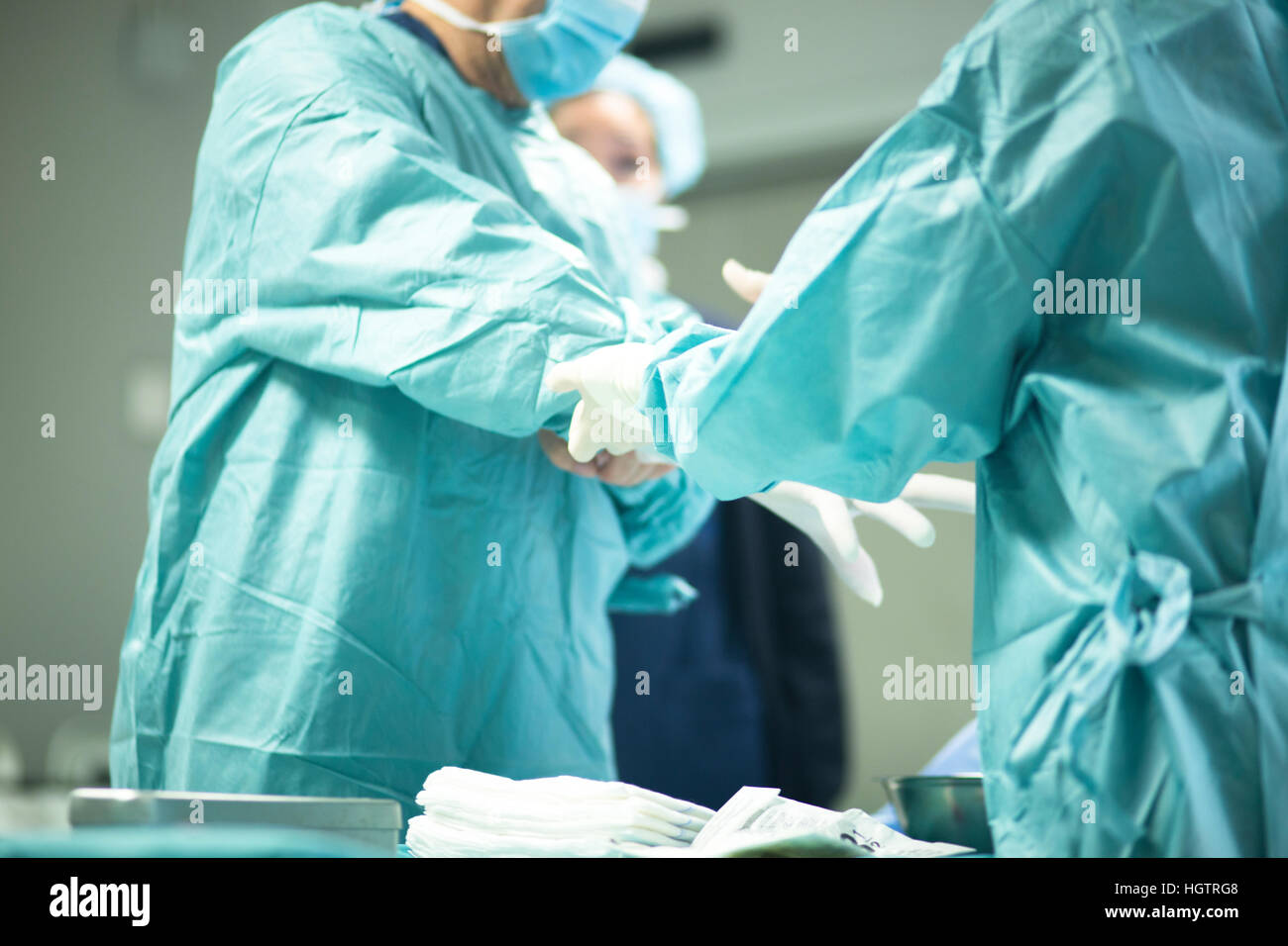 Surgeon in hospital surgery in sterile uniform "scrubs" in operating ...
