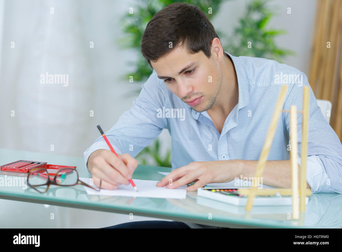 architect writing on blueprints Stock Photo - Alamy