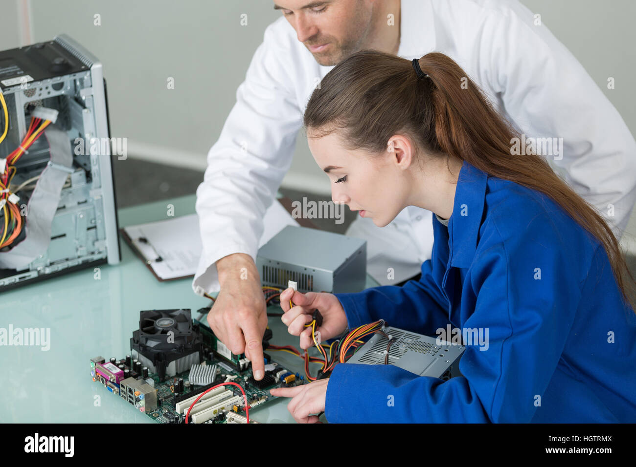 Student learning to repair computer Stock Photo - Alamy