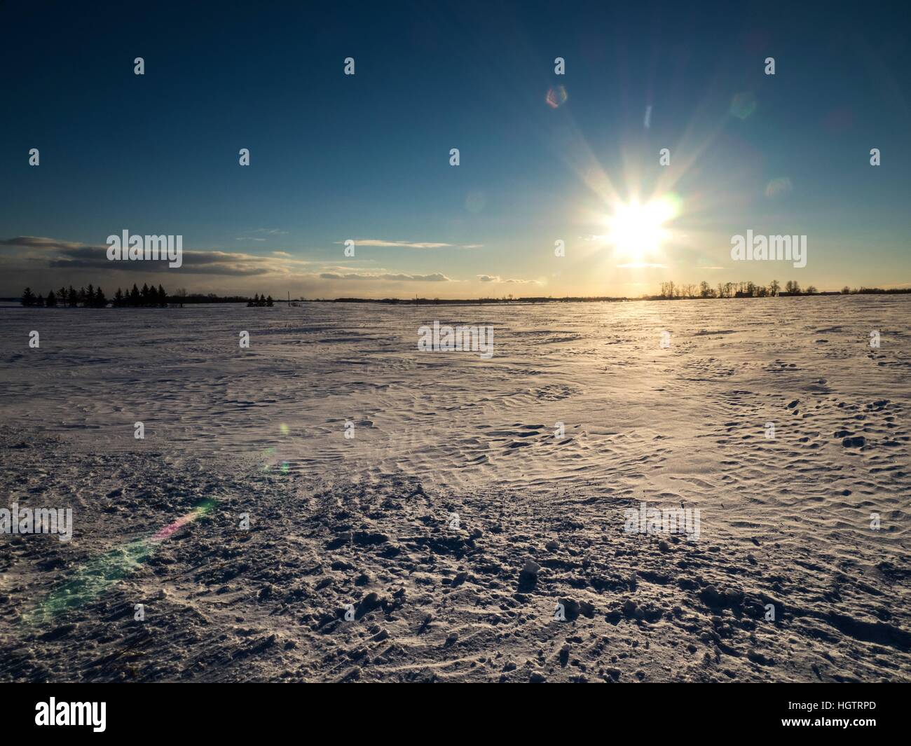 Sunset Over Snow In Winter Trees Orange Glow snow cold fence field ...