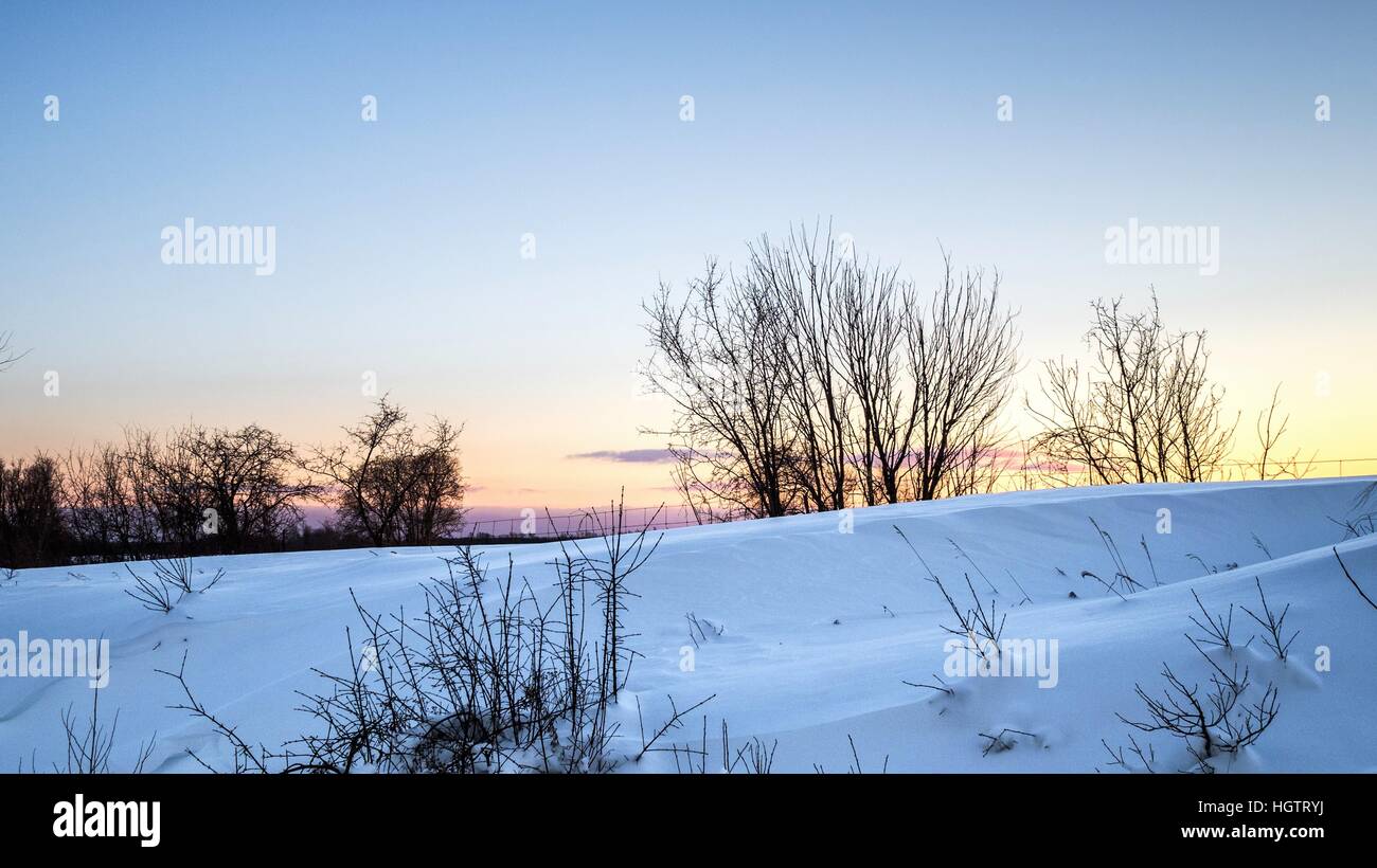 Snow in sunset hi-res stock photography and images - Alamy