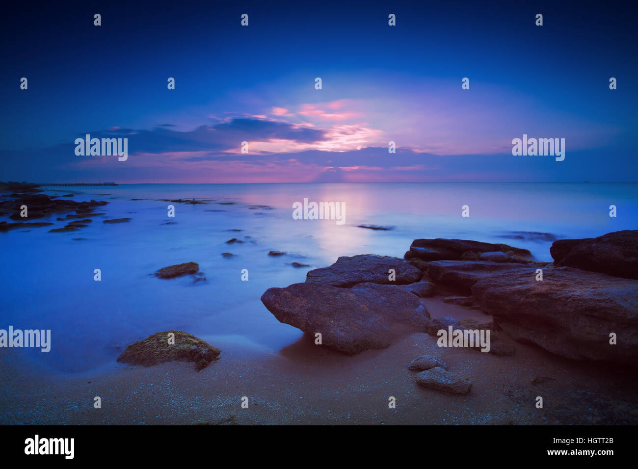 Early morning, pink sunrise over the sea Stock Photo - Alamy