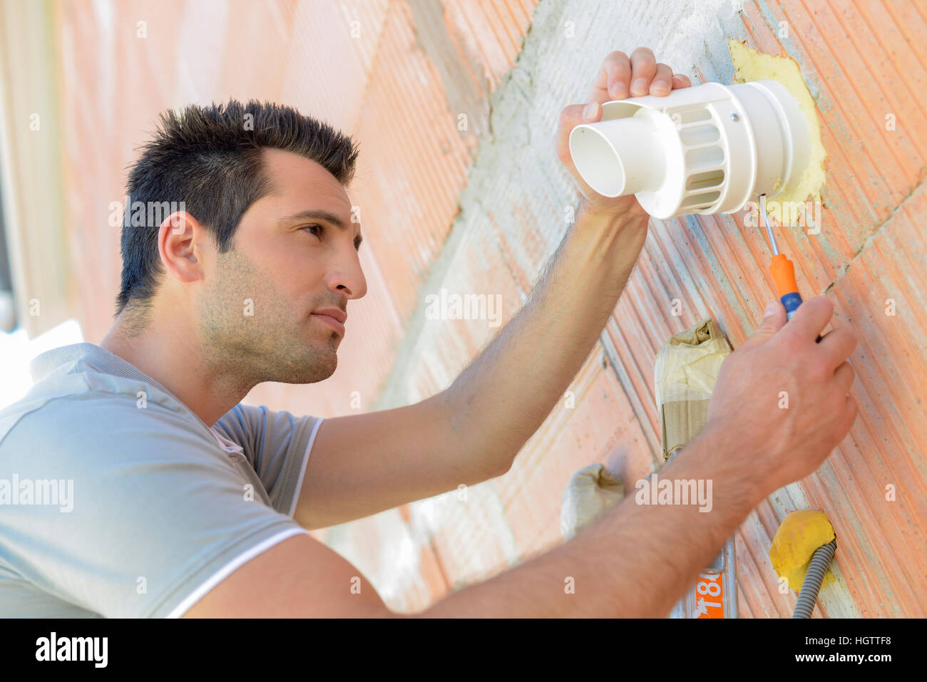 Repairing ventilation hatch Stock Photo - Alamy