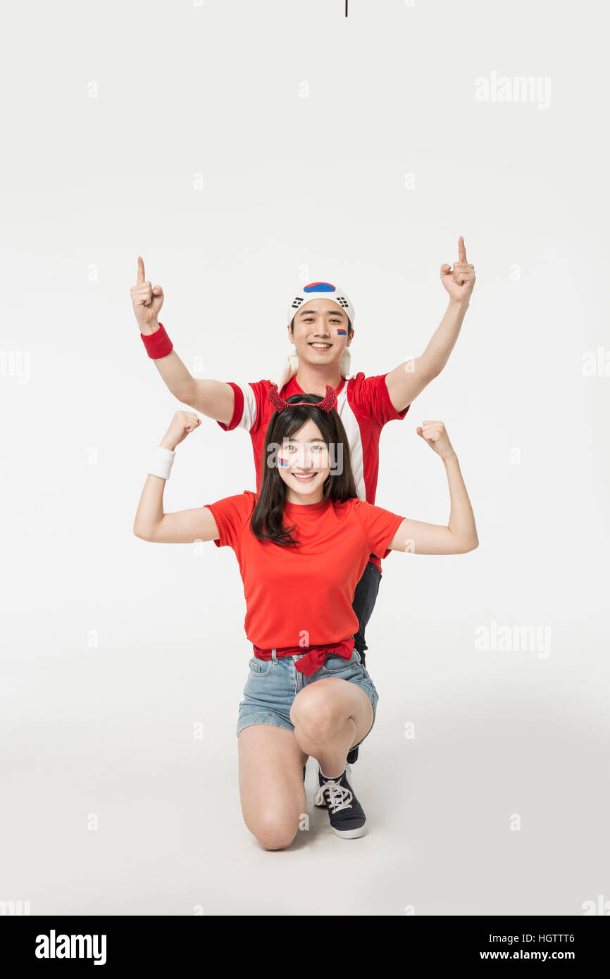 Young smiling cheerleaders posing hi-res stock photography and images ...