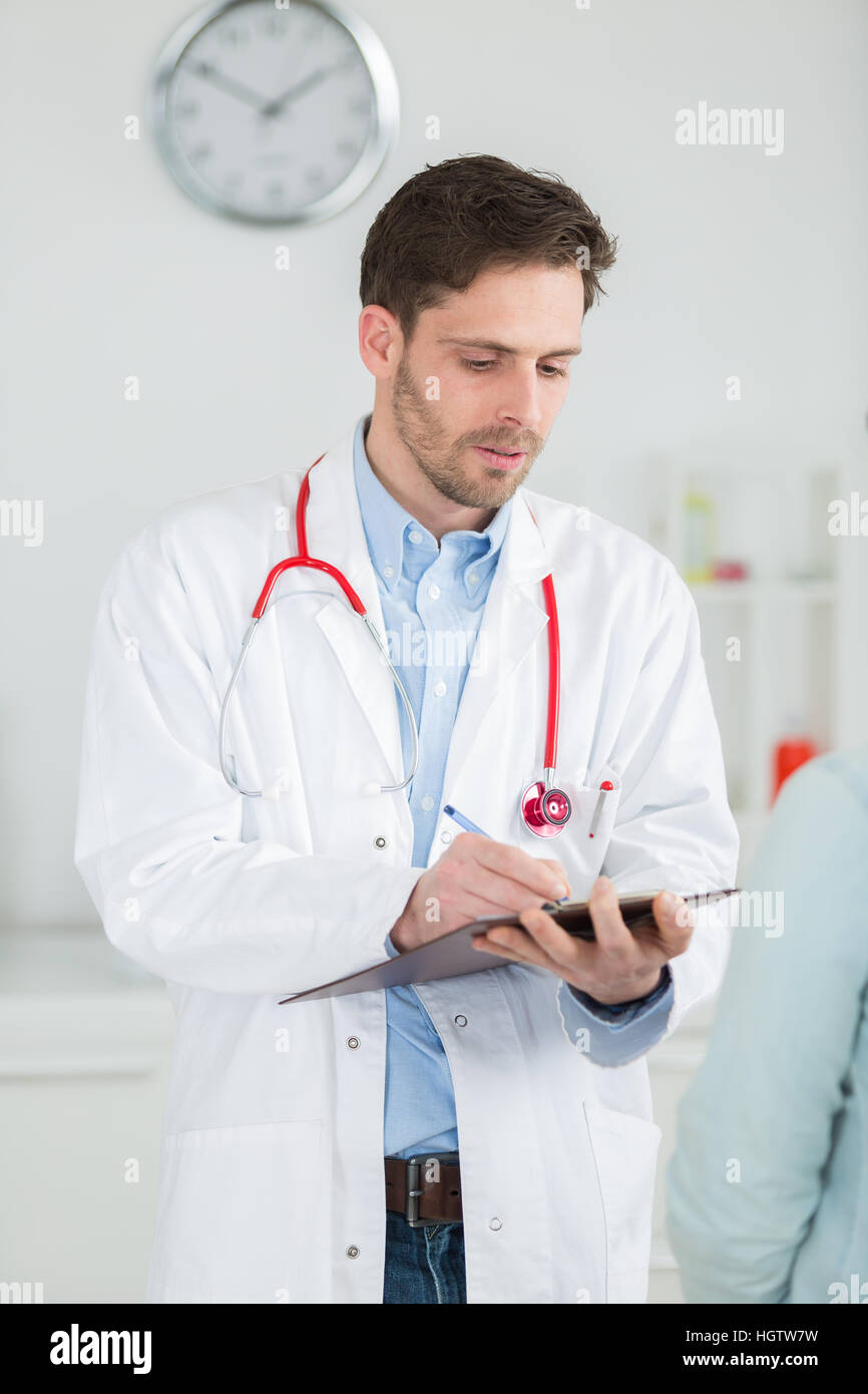 medical doctor writing prescription Stock Photo - Alamy