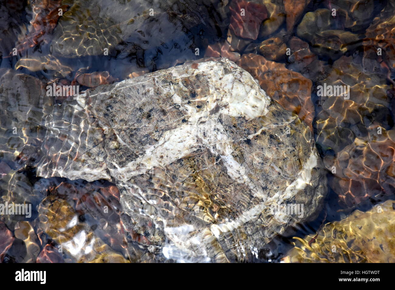 Underwater pebbles wallpaper. Water Through Rocks background and ...