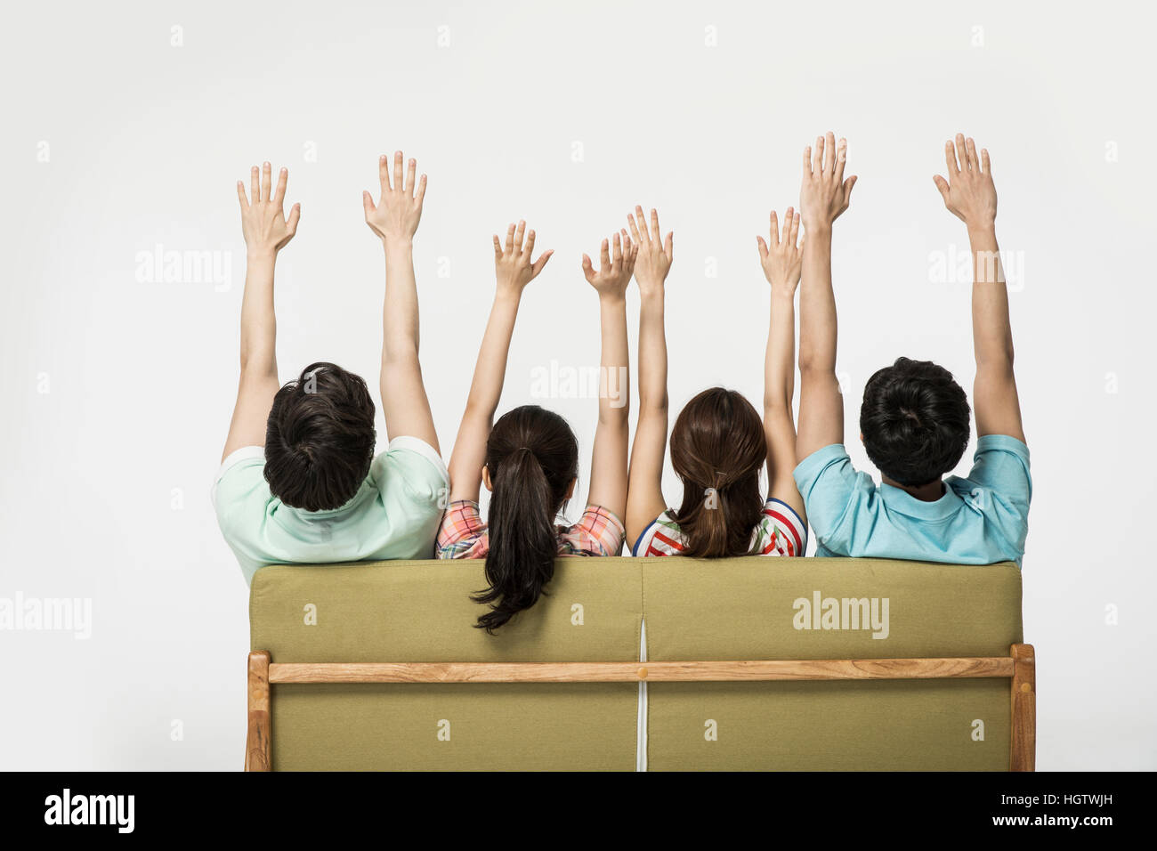 Back young people cheering sitting hi-res stock photography and images ...