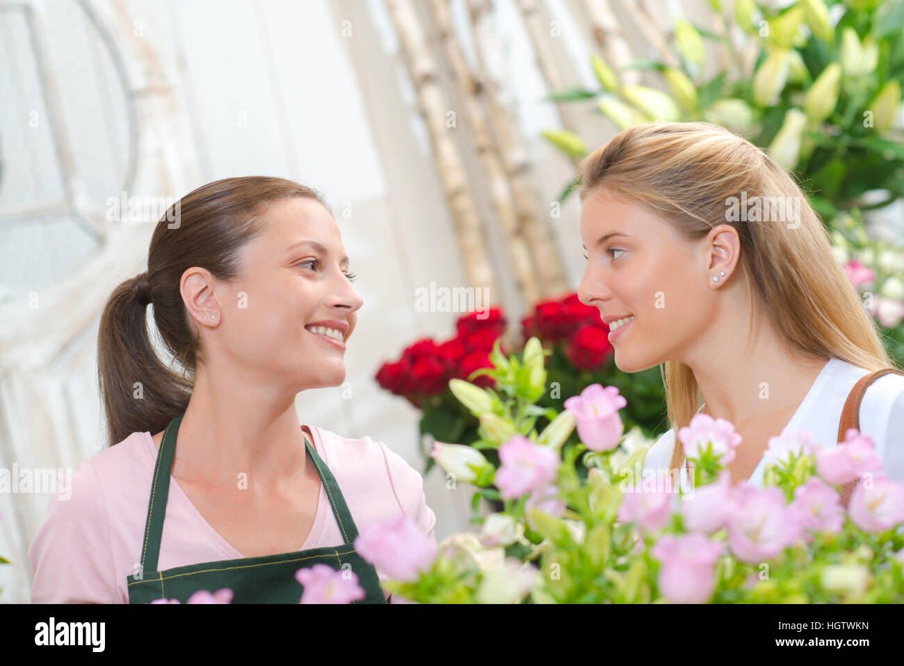 Florist and her assistant Stock Photo - Alamy