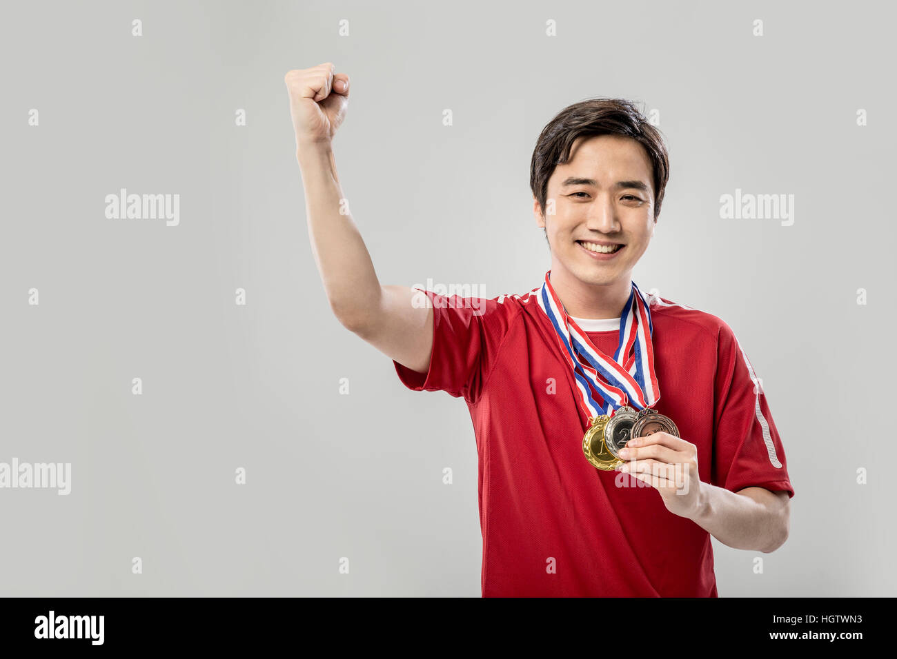 Person winning gold medal hi-res stock photography and images - Alamy