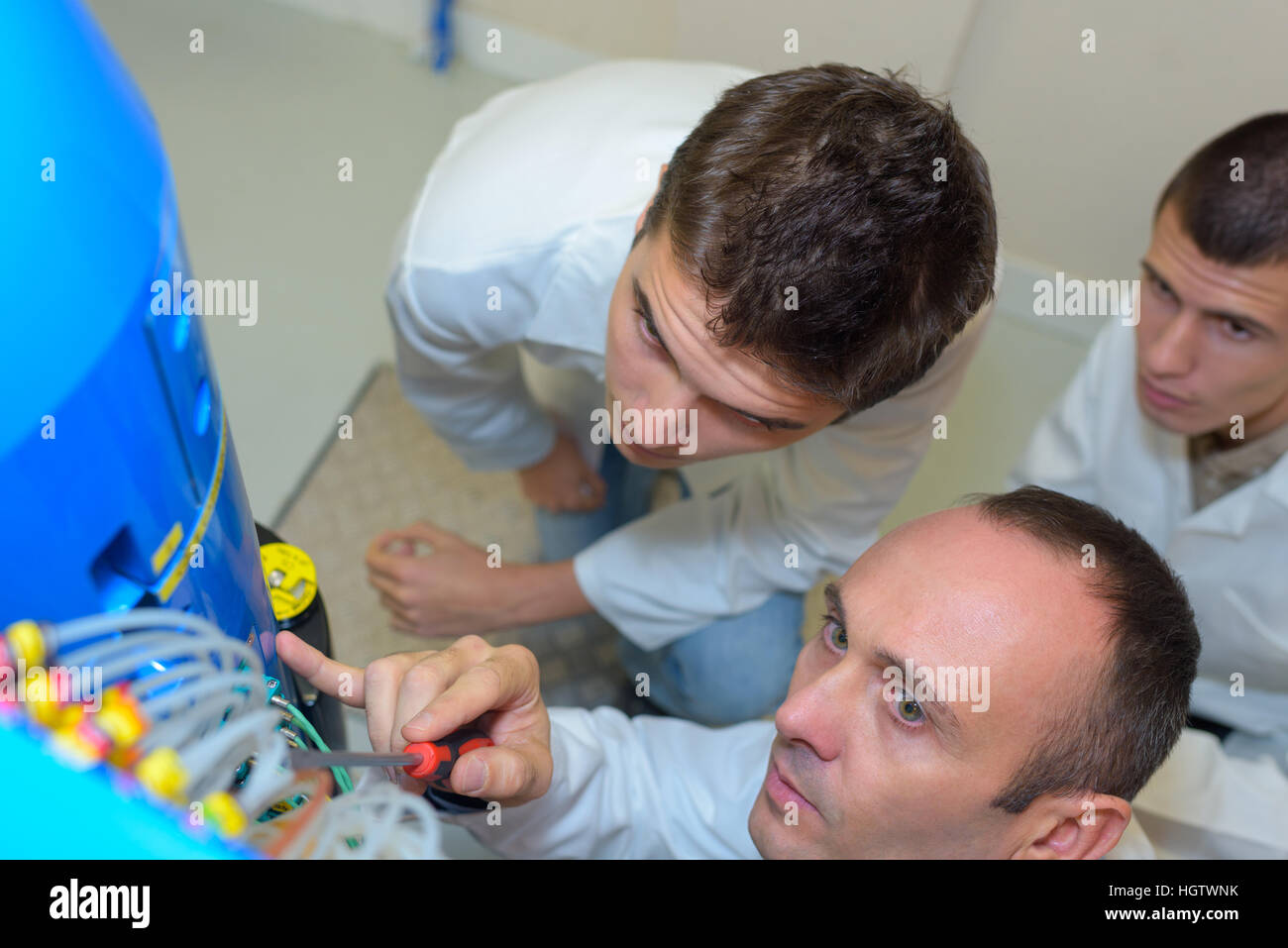 pointing a small part Stock Photo - Alamy