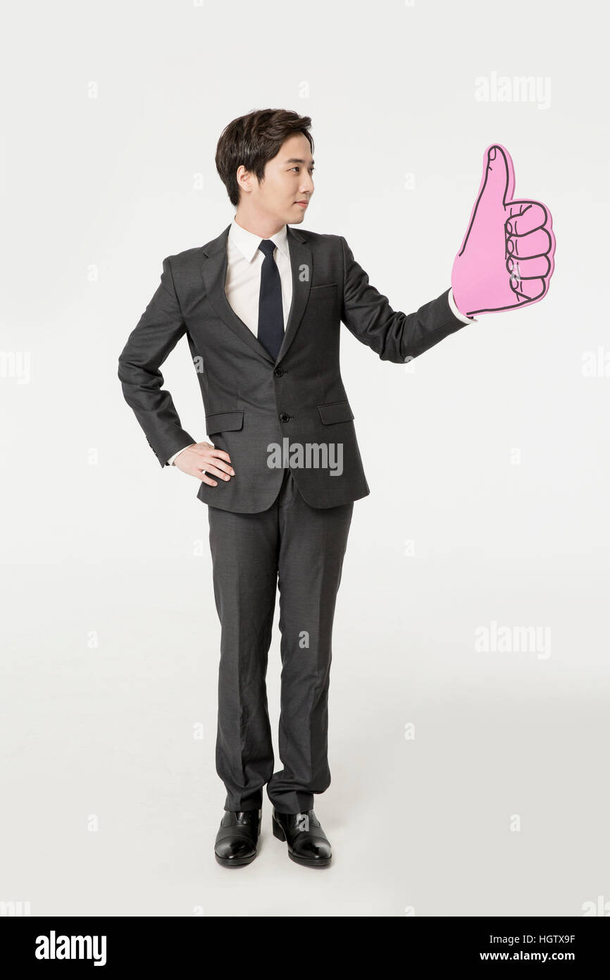 Man side view thumb up hi-res stock photography and images - Alamy