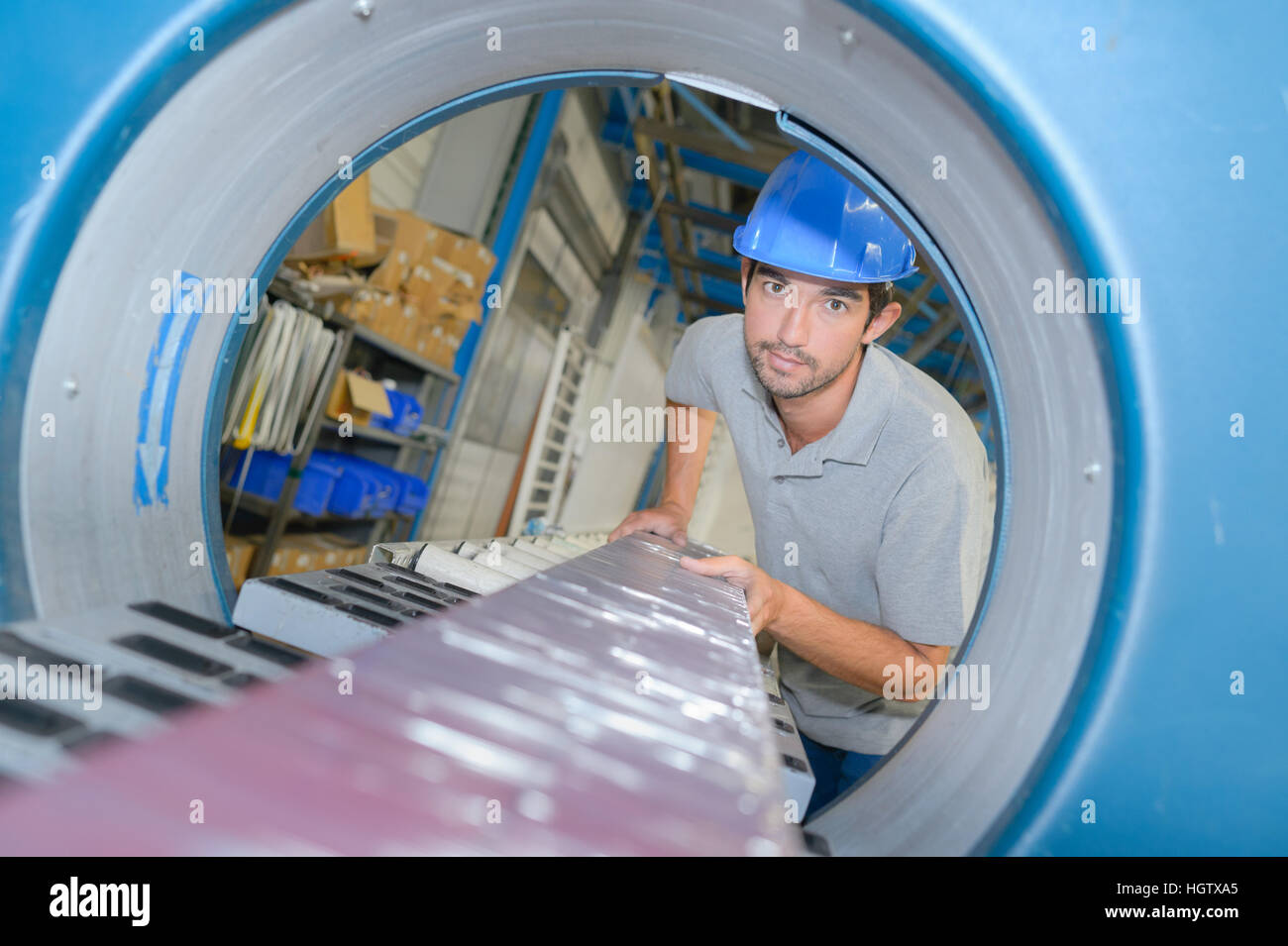 machine package tender at work Stock Photo - Alamy