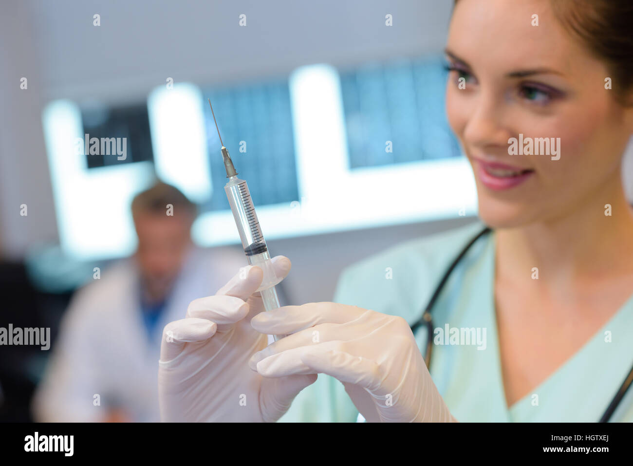 Nurse preparing injection Stock Photo - Alamy
