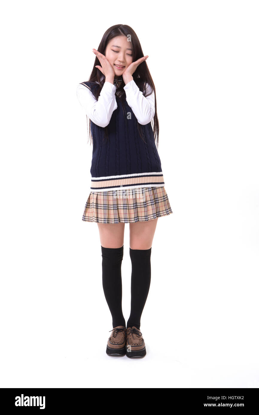 Smiling high school girl posing Stock Photo - Alamy