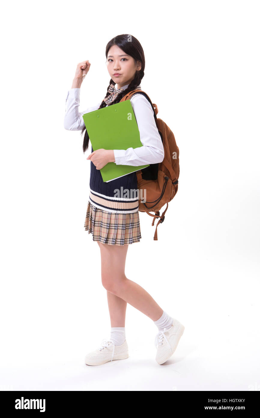 Side view of school girl with backpack and file posing cheering Stock ...