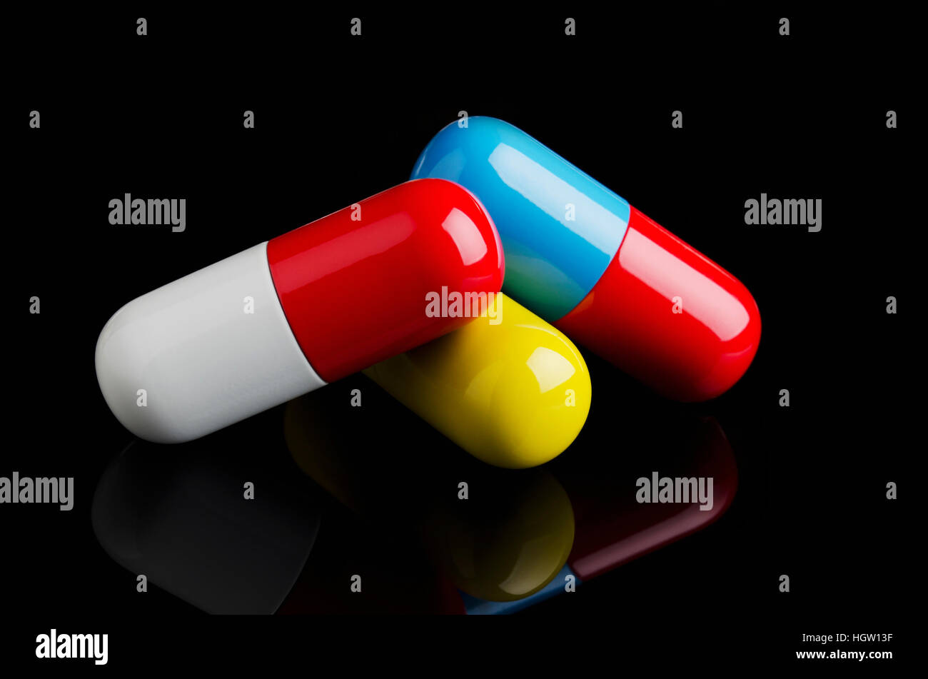 Three Large Pills Stock Photo - Alamy