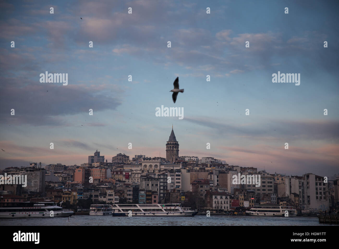 The sun sets behind Galata Tower in Istanbul Stock Photo - Alamy