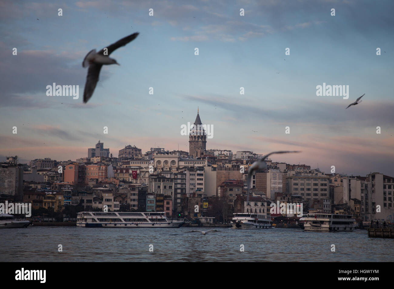 The sun sets behind Galata Tower in Istanbul Stock Photo - Alamy