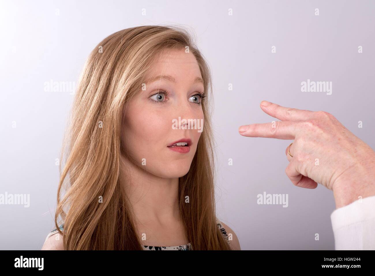 Threatening gestures hi-res stock photography and images - Alamy