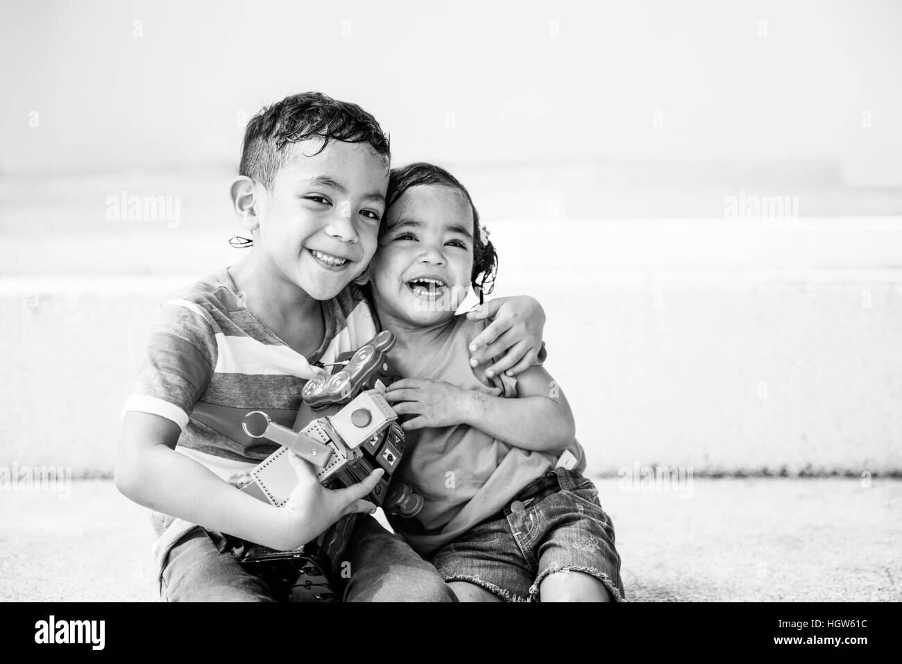 Brother sister smiling park Black and White Stock Photos & Images - Alamy