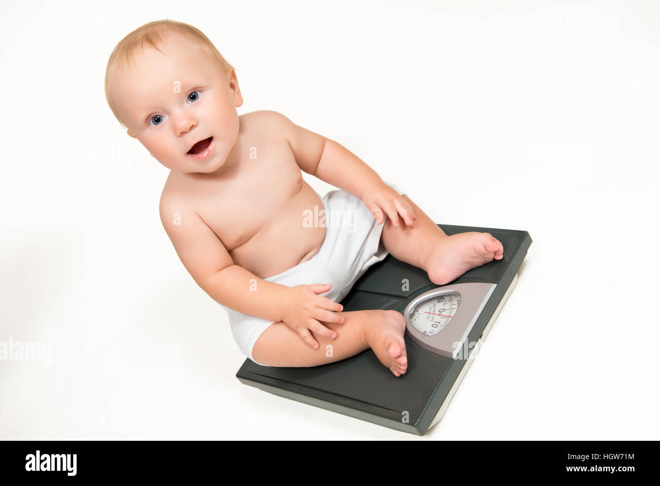 Fat Child Boy Scales High Resolution Stock Photography and Images - Alamy