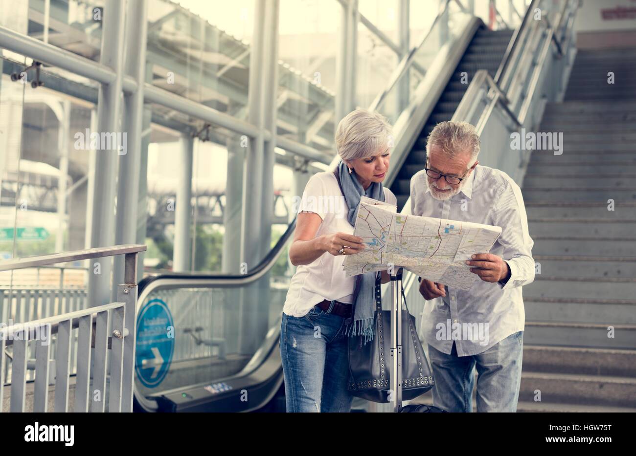 Senior couple traveling around the city Stock Photo - Alamy