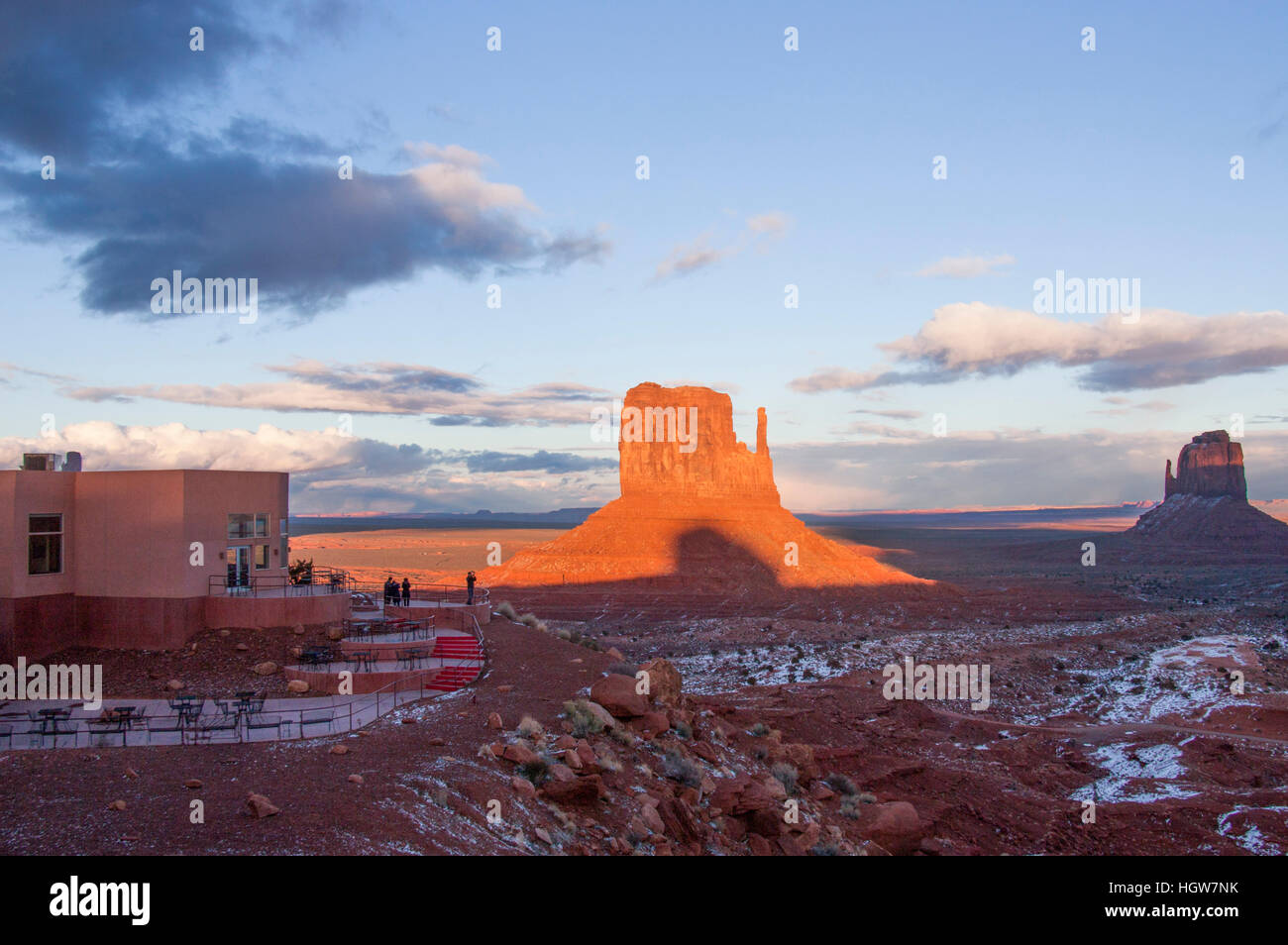 Tourists from hotel (left), West and East Mitten Buttes (Background ...