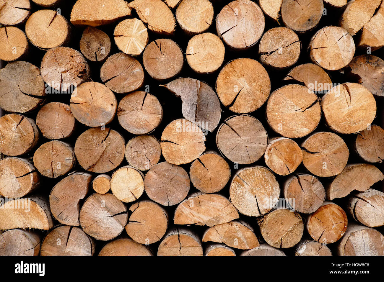 Pile of wood logs storage Stock Photo - Alamy