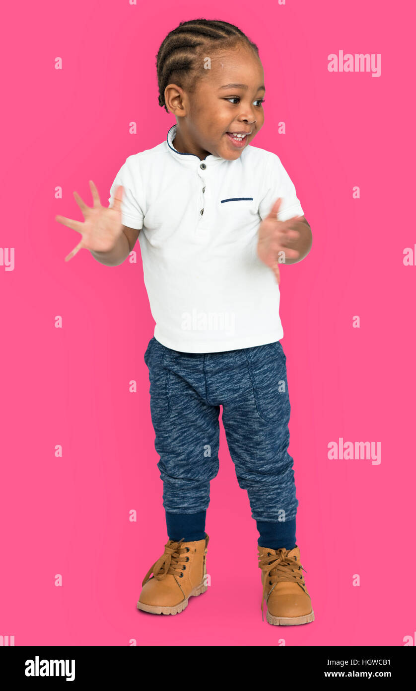 Kid Pose Standing Studio Concept Stock Photo - Alamy