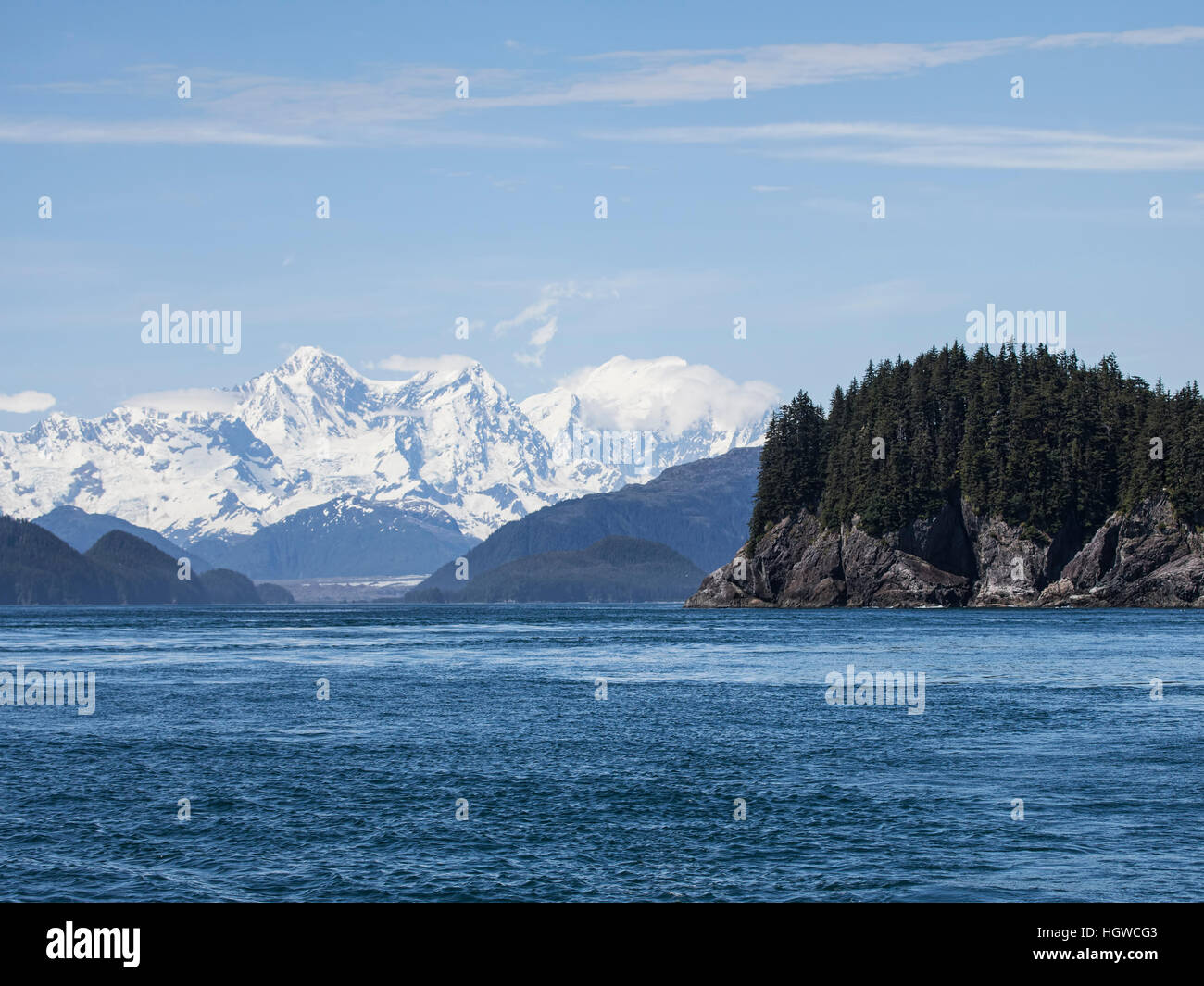 View from the water in Cross Sound passing the Inian Islands with a ...