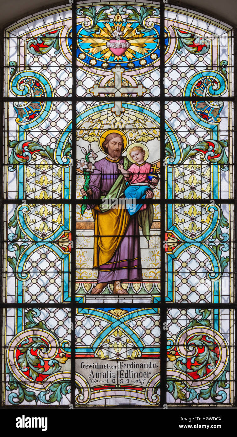 VIENNA, AUSTRIA - DECEMBER 19, 2016: The St. Joseph on the stained ...