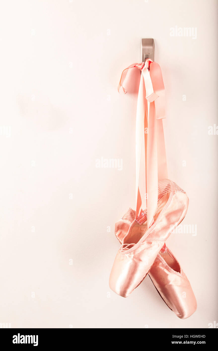 Pink Ballet shoes on white background Stock Photo - Alamy