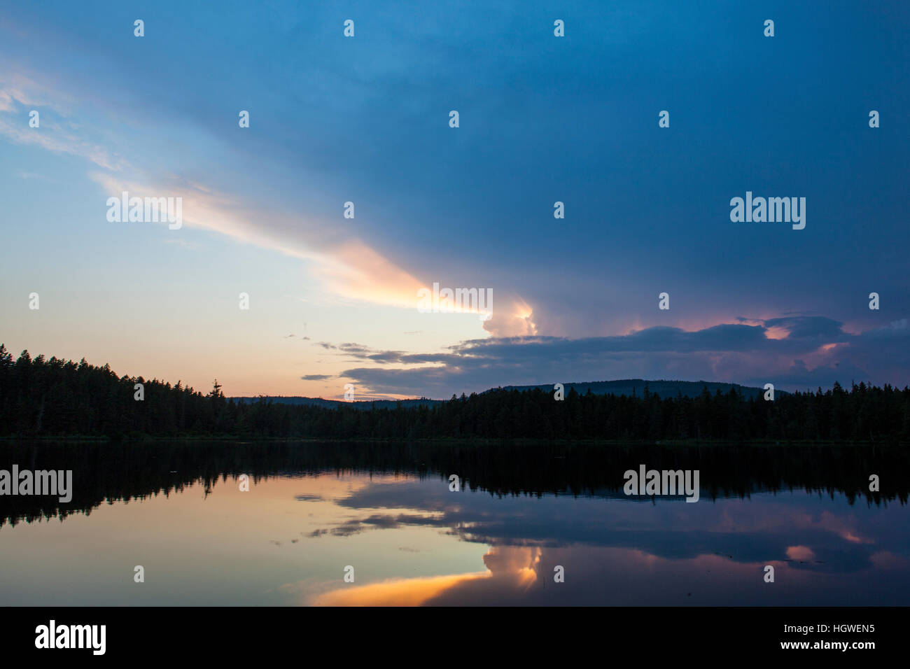 Sunset on Little Berry Pond in Maine's Northern Forest. Cold Stream ...