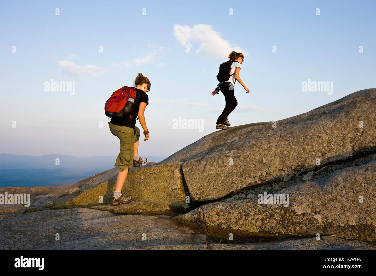 Two women hikers on the summit of Mount Monadnock in Monadnock State ...