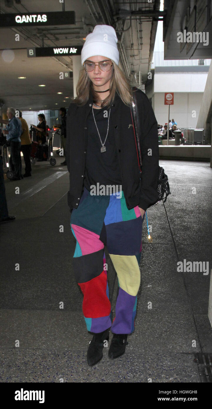 Cara Delevingne Arrives At Los Angeles International Airport Featuring cara-delevingne-arrives-at-los-angeles-international-airport-featuring