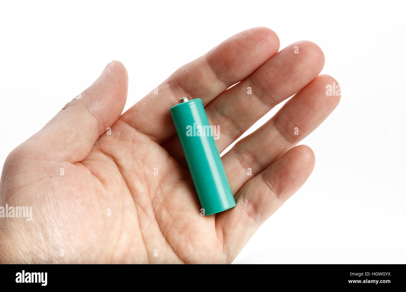 green battery with white background, close up Stock Photo - Alamy