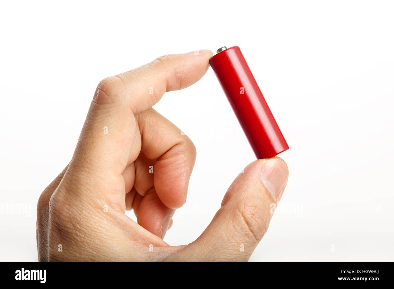 red battery with white background, close up Stock Photo - Alamy