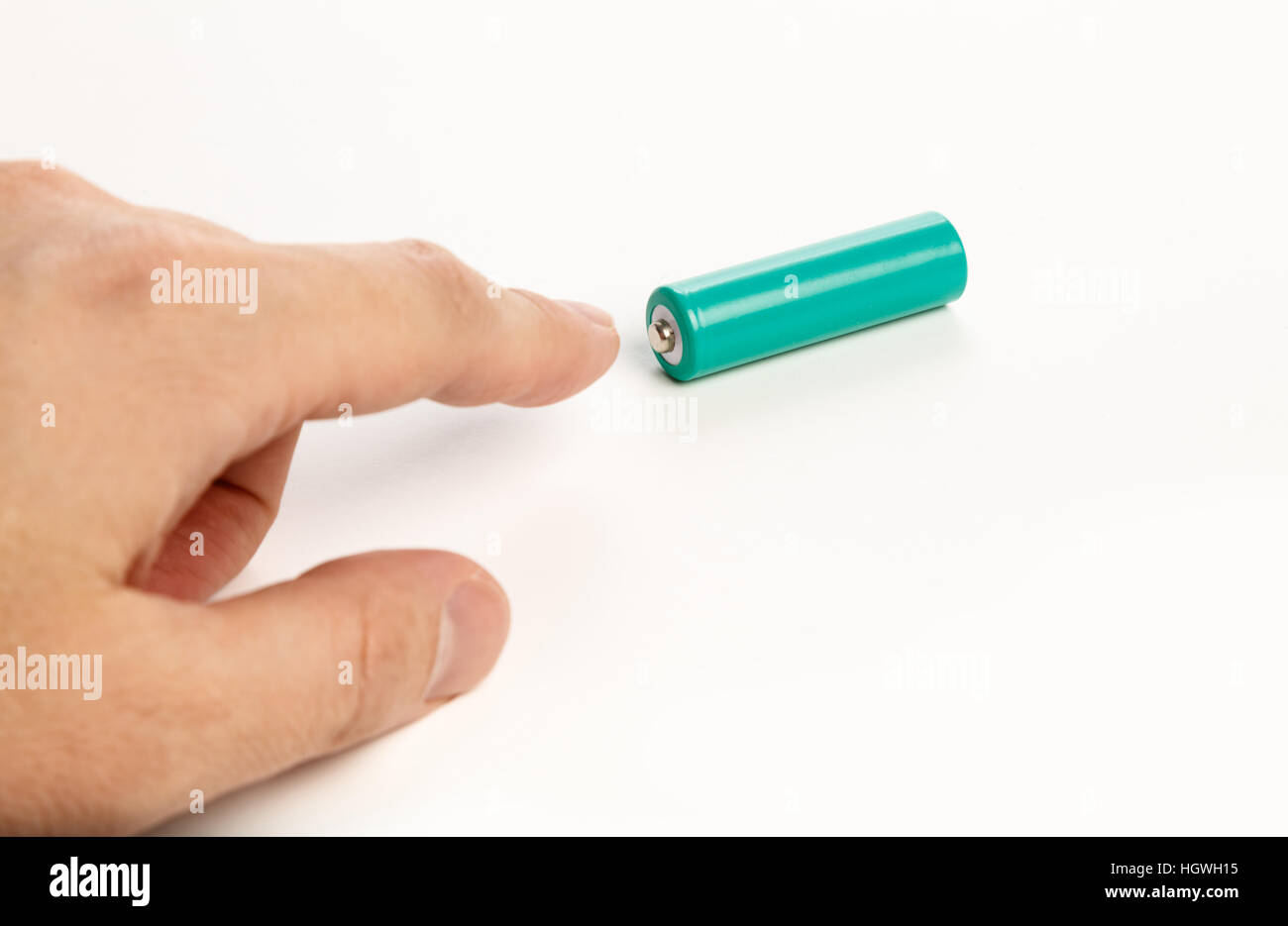 green battery with white background, close up Stock Photo - Alamy