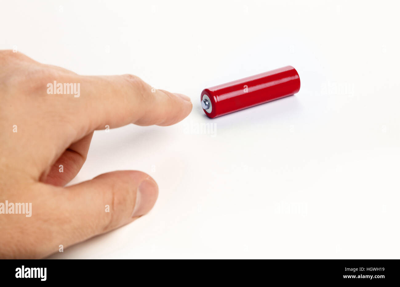 red battery with white background, close up Stock Photo - Alamy