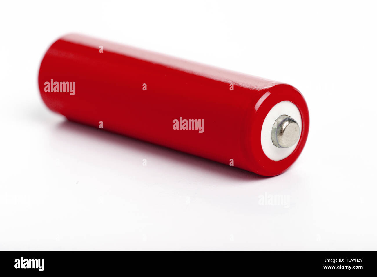 red battery with white background, close up Stock Photo - Alamy