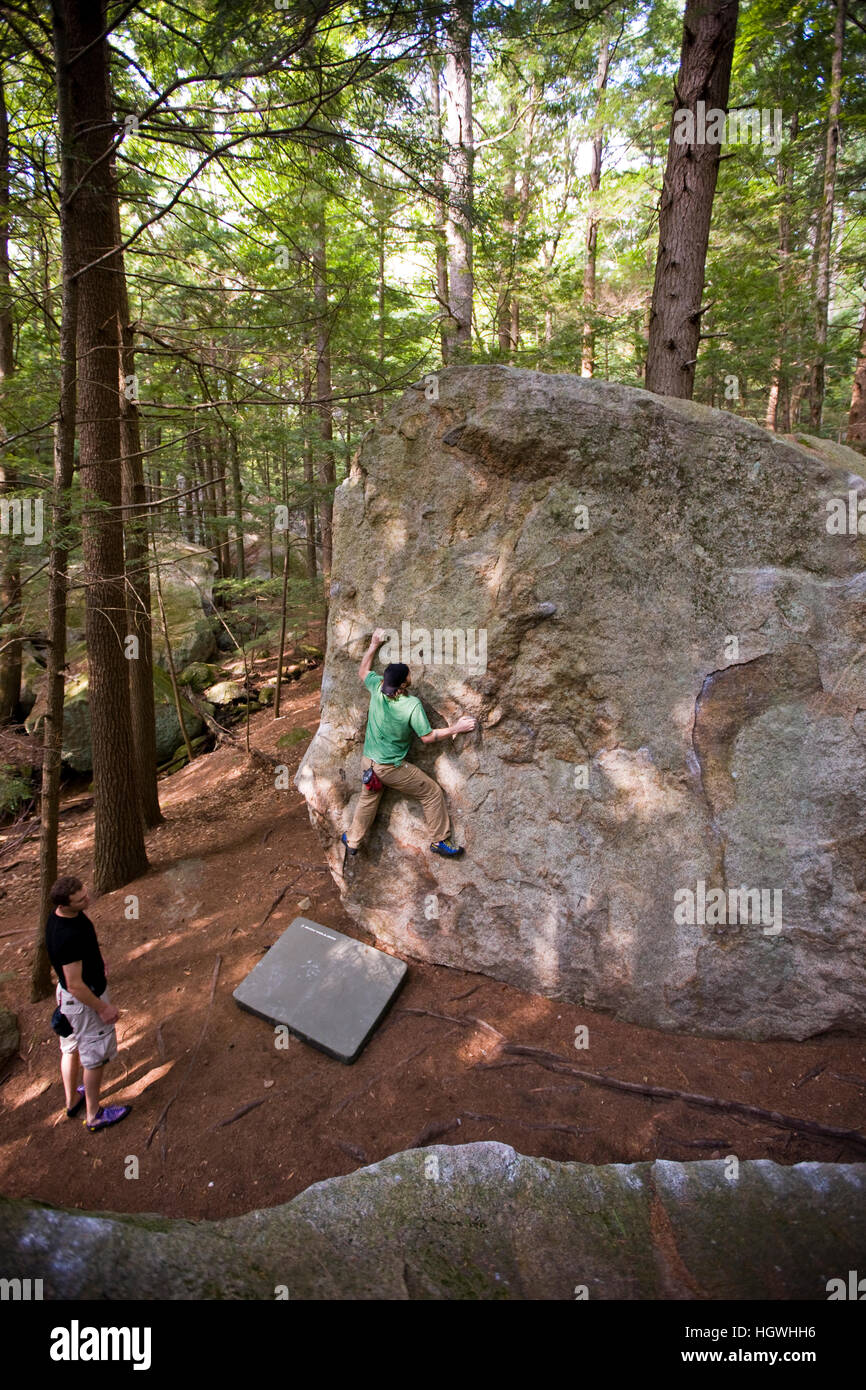 A man bouldering in "The Boulders" section of New Hampshire's ...