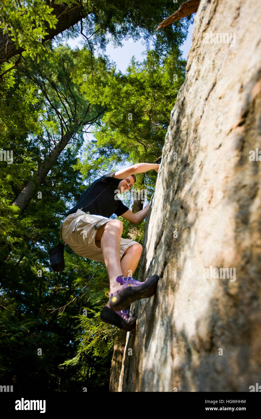 A man bouldering in "The Boulders" section of New Hampshire's ...