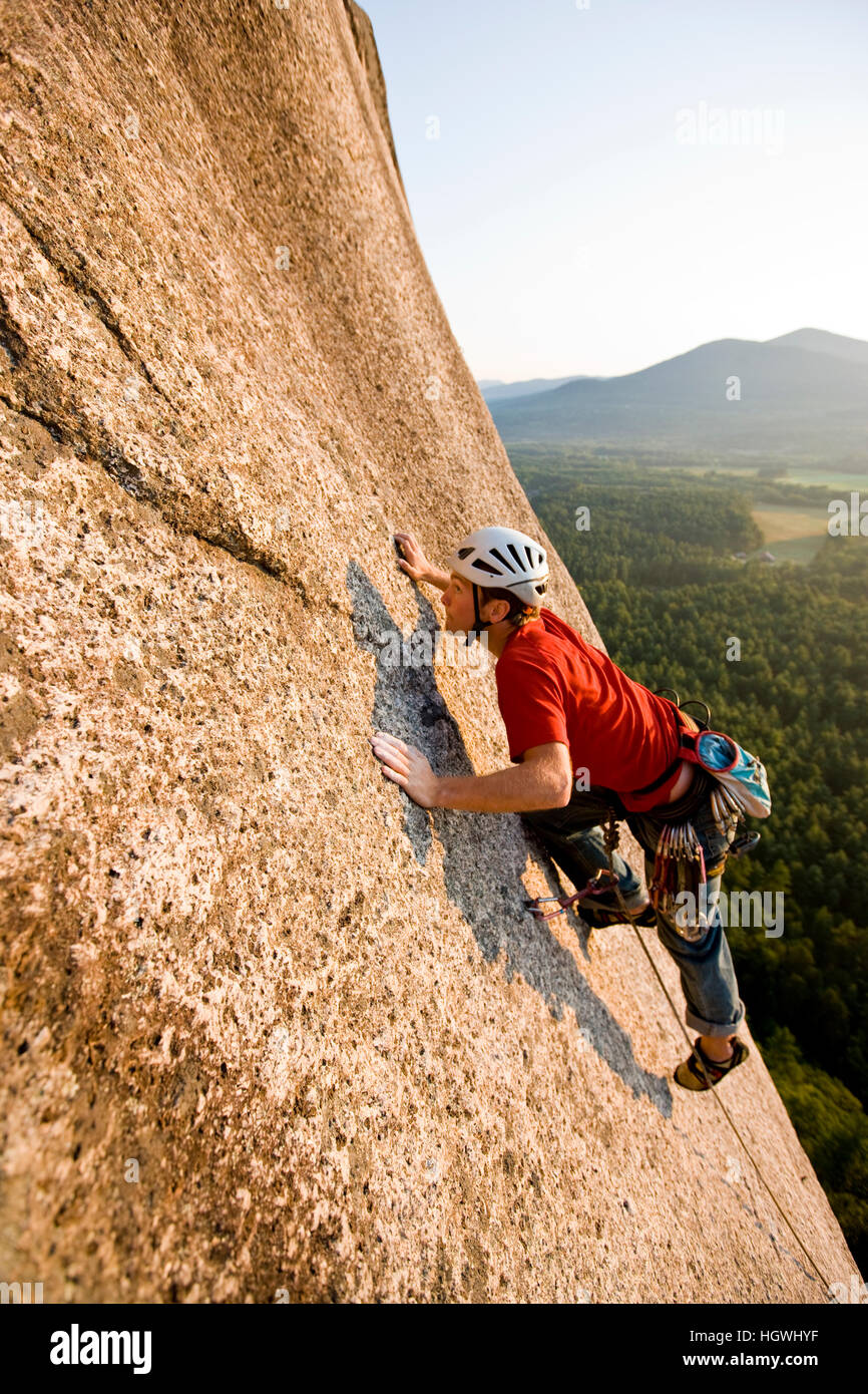 A man rock climbing near the top of Cathedral Ledge. Echo Lake State ...