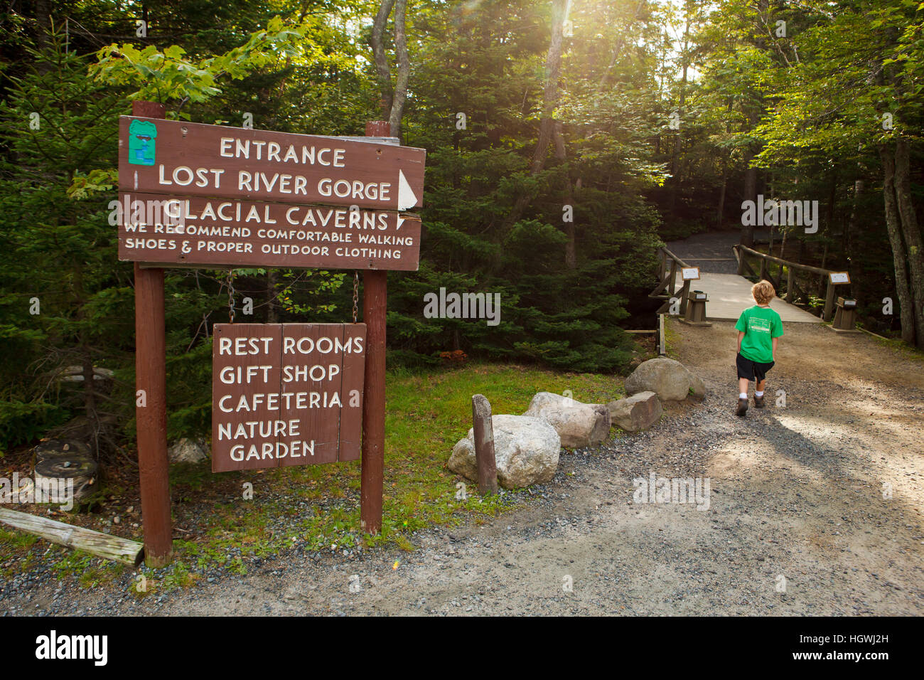 A youg boy at the entrance to Lost River Gorge in New Hampshire's White ...