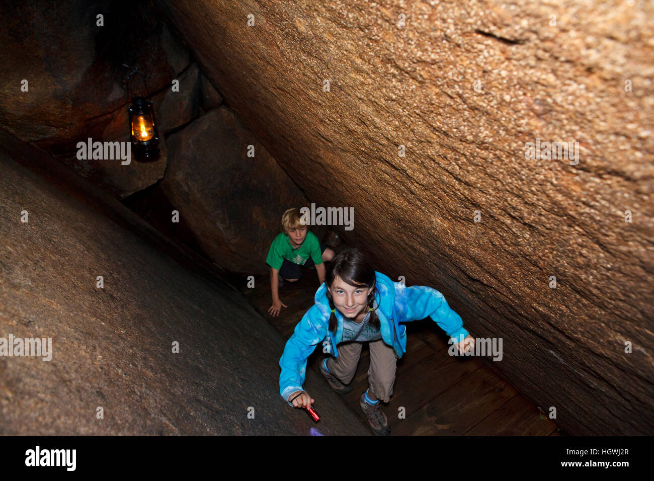 A young brother and sister explore a cave at Lost River Gorge in New ...