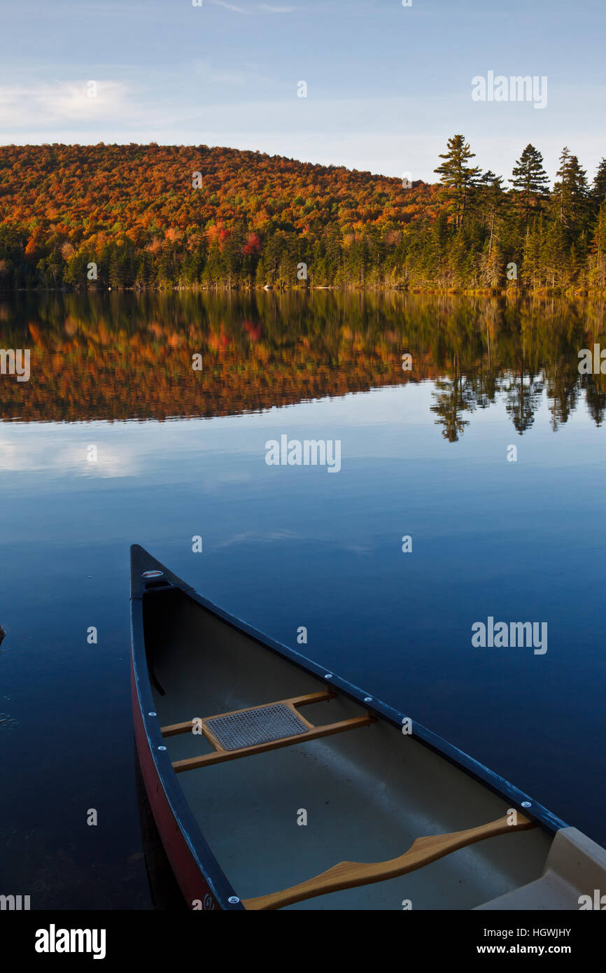 A canoe on the shoreline of Pond of Safety in the Randolph Community ...