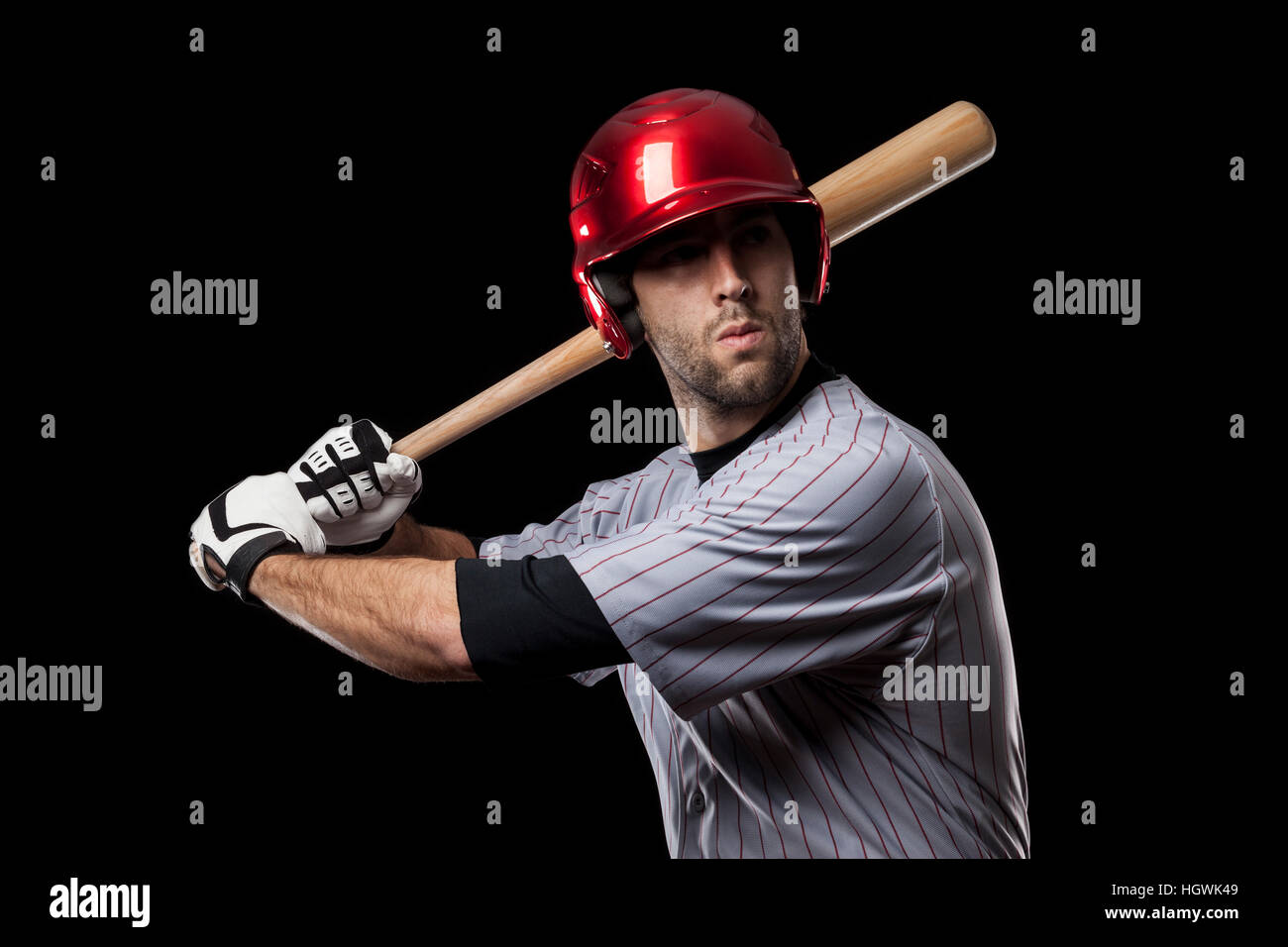 Baseball Player on a black background. Studio Shot Stock Photo - Alamy