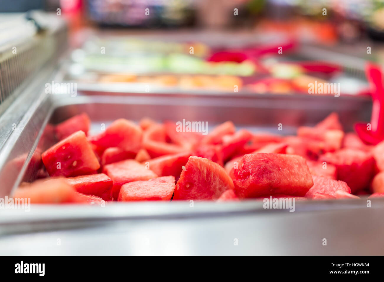 Watermelon buffet salad bar self serve with scoop Stock Photo - Alamy